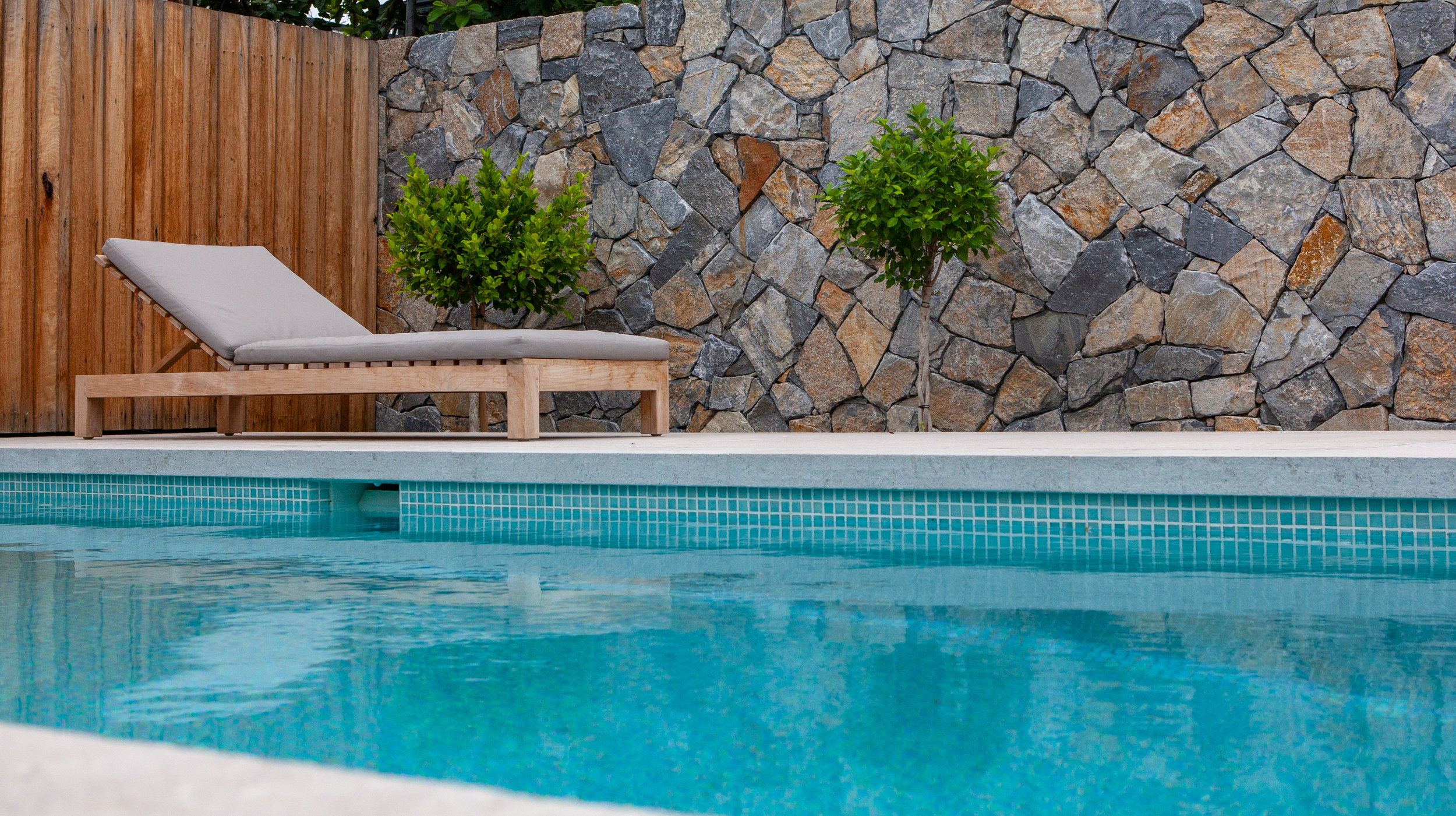 Swimming pool tiles, coping stone, pavers & Glass mosaic - Aussietecture
