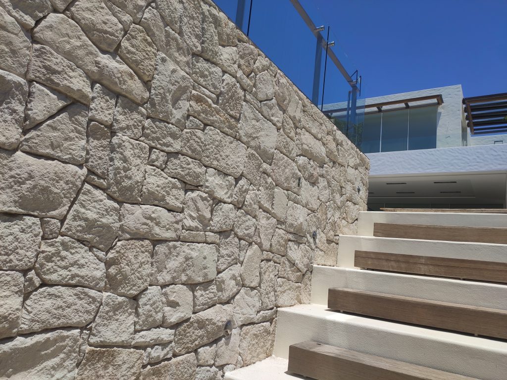 White sandstone cladding - Stone house build with local sandstone